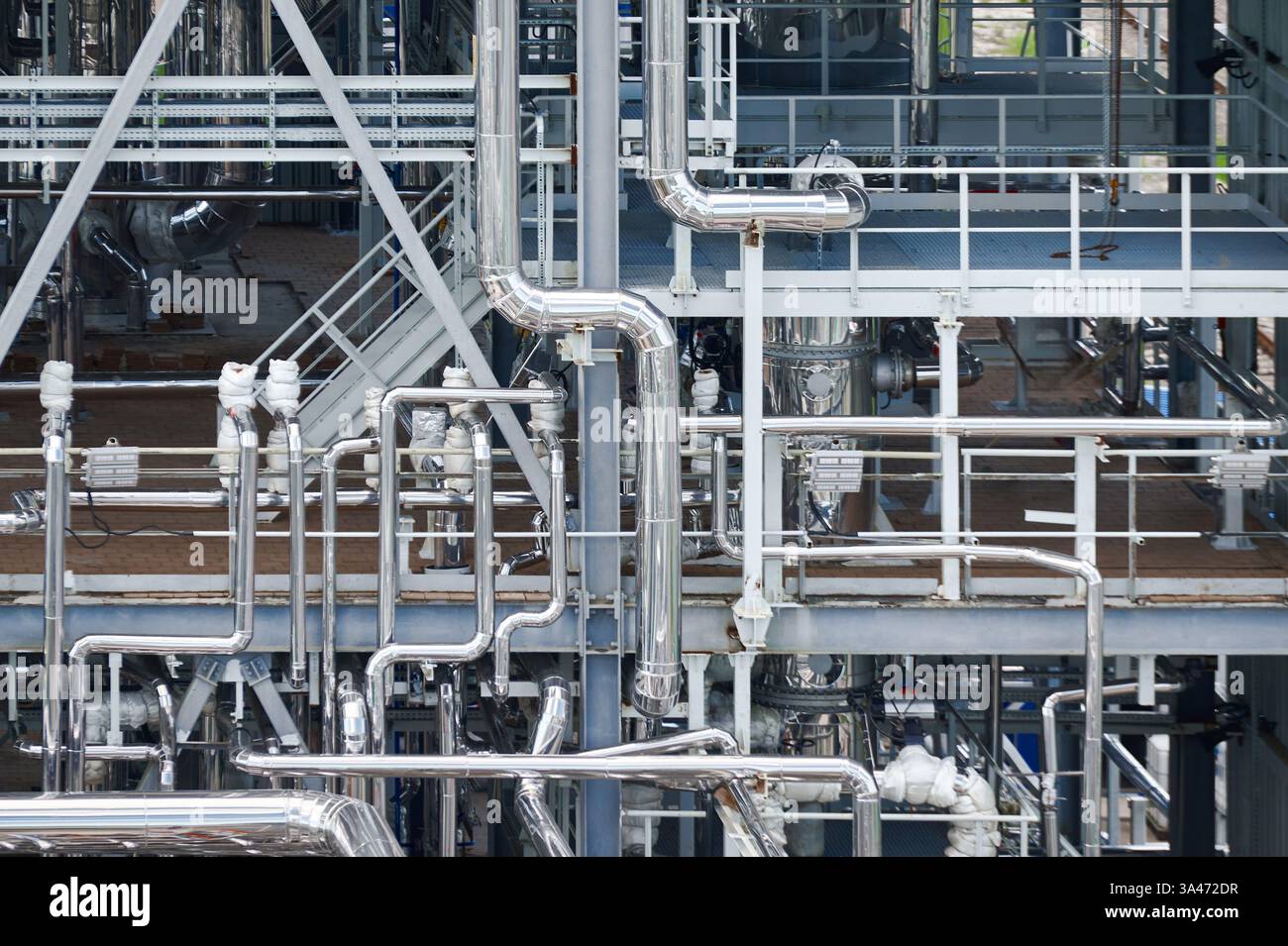Pipelines and structures of a chemical plant showcasing industrial ...