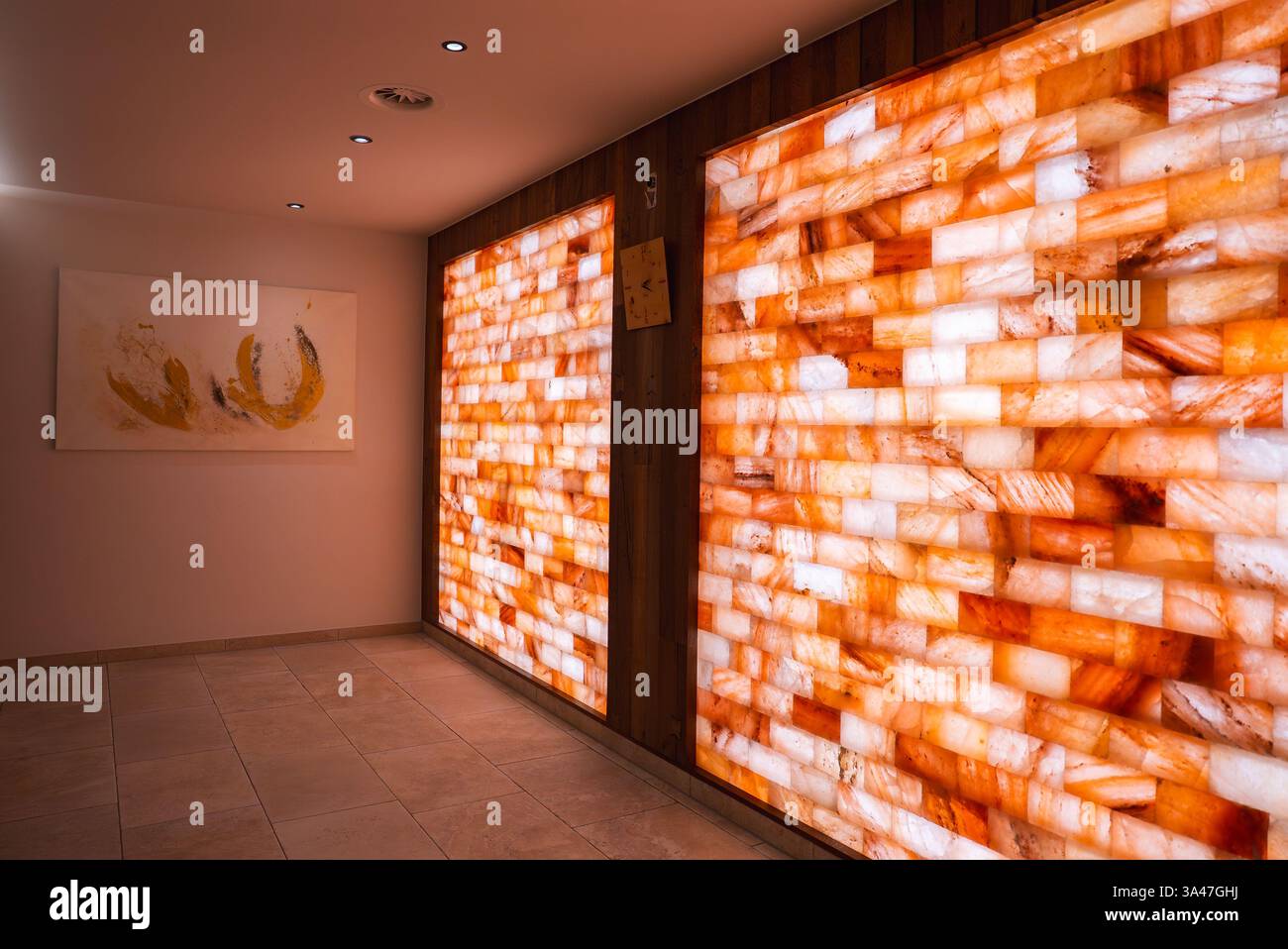 Luxurious Interior with Illuminated Salt Brick Walls in Ischgl Hotel ...