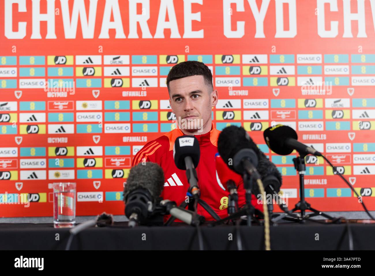 PONTYCLUN, UK. 18th Mar, 2025. Wales' Tom Lawrence during a media ...
