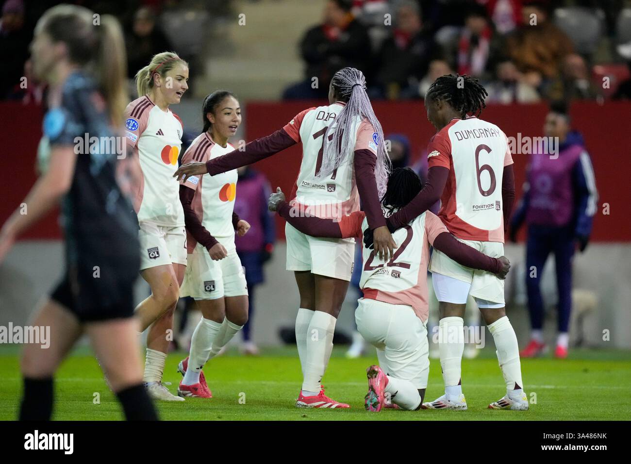 Lyon players celebrate after Tabitha Chawinga, 2nd right, scored the ...