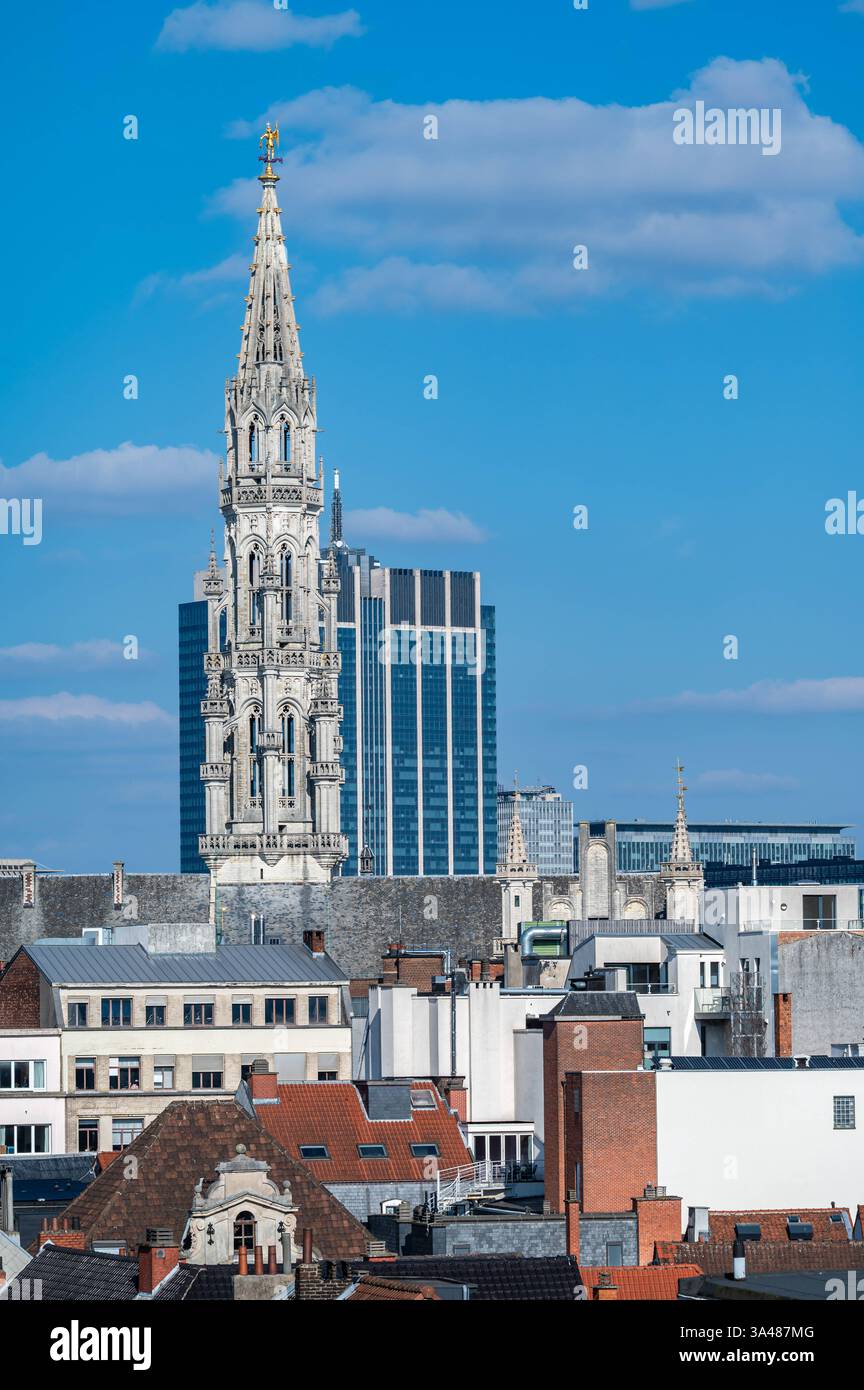 Town hall gothical tower and contemporary finance tower in the ...