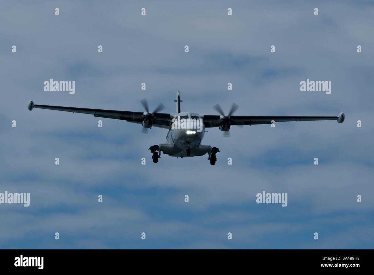 The L410 aircraft prepares for landing. Twin-engine short-range ...