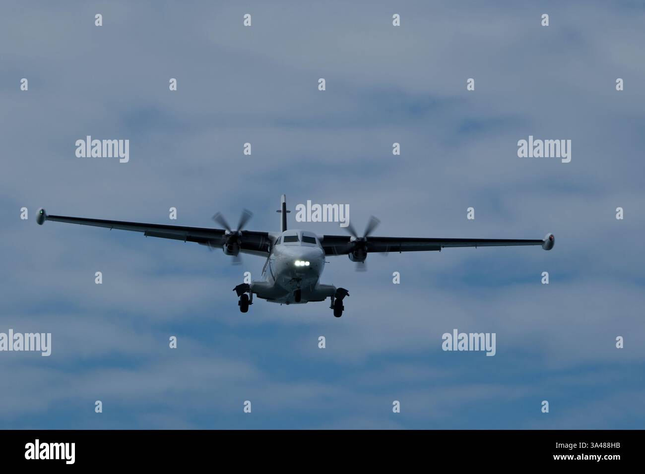 The L410 aircraft prepares for landing. Twin-engine short-range ...