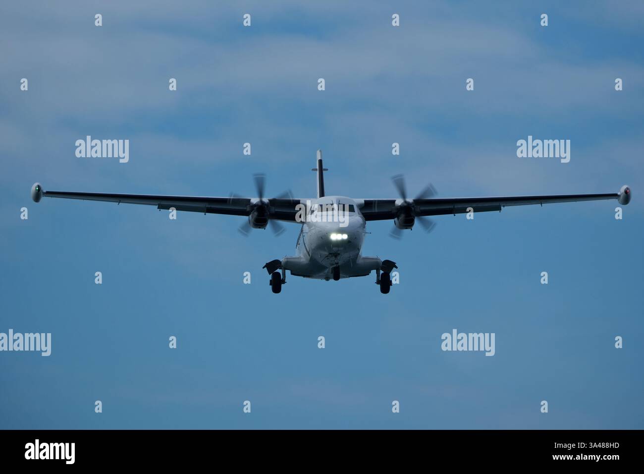 The L410 aircraft prepares for landing. Twin-engine short-range ...