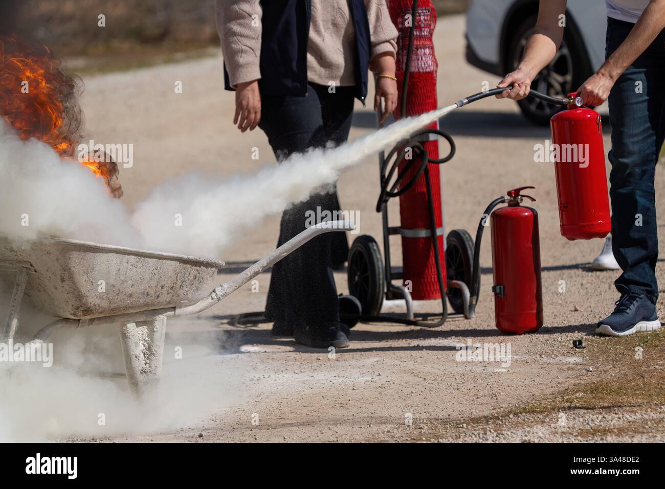 Fire extinguisher used during fire drill in Turkey Stock Photo - Alamy