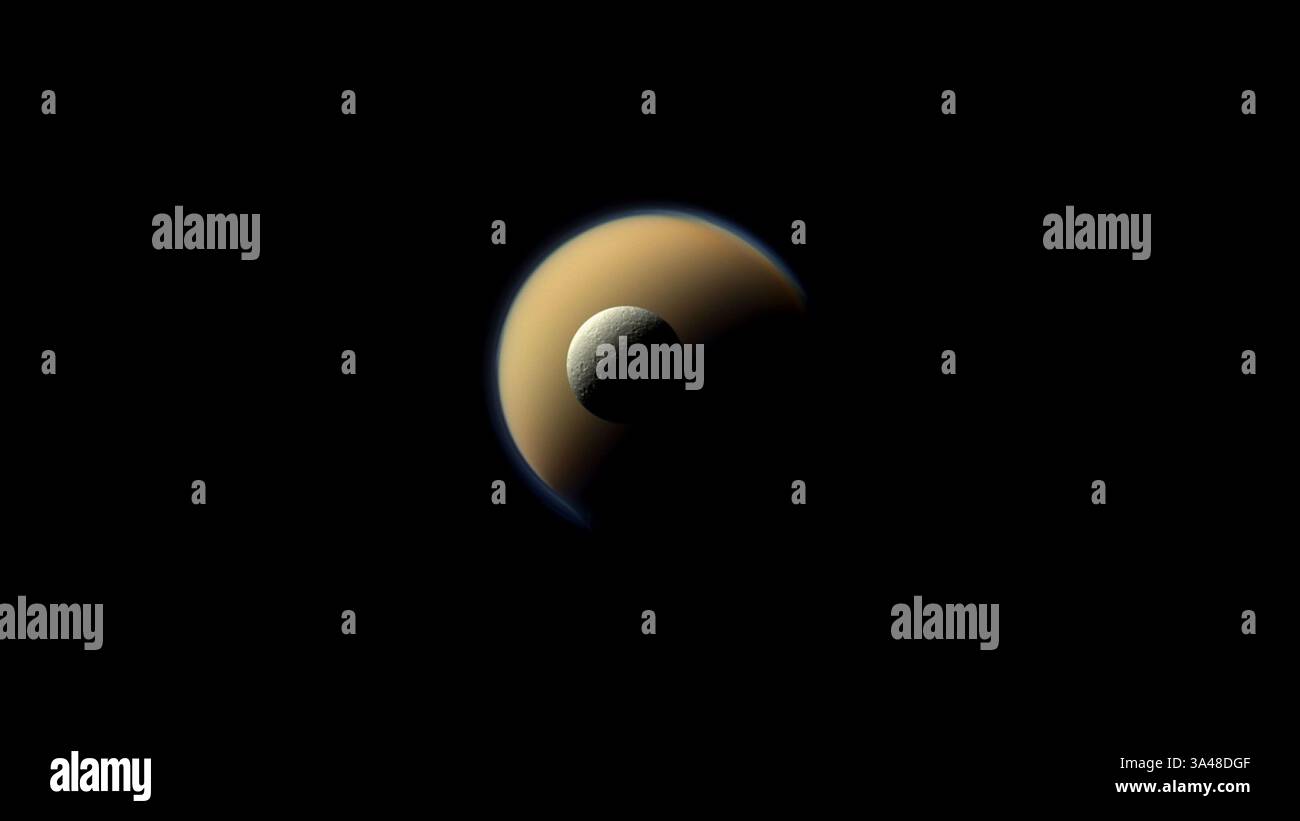 Dec. 27, 2013 - Saturn's largest and second largest moons, Titan and ...