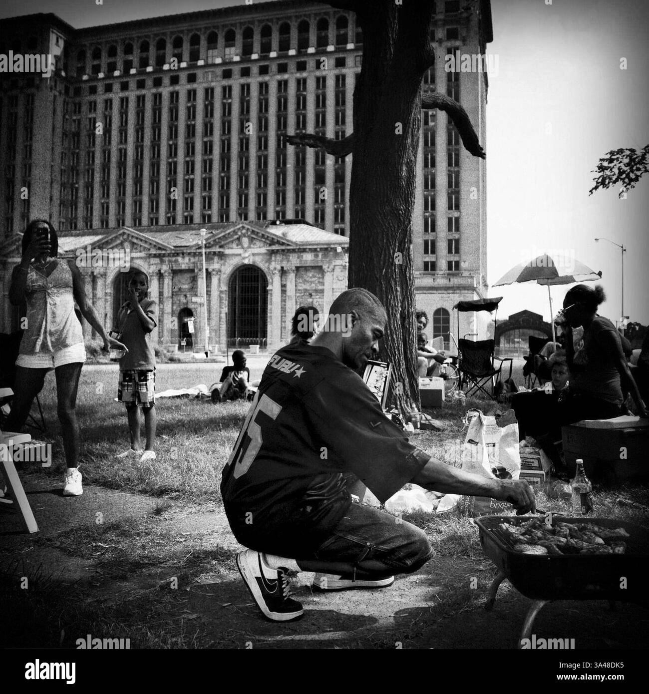 Casey Nash, 53, of Hamtramck grills with family and friends at ...