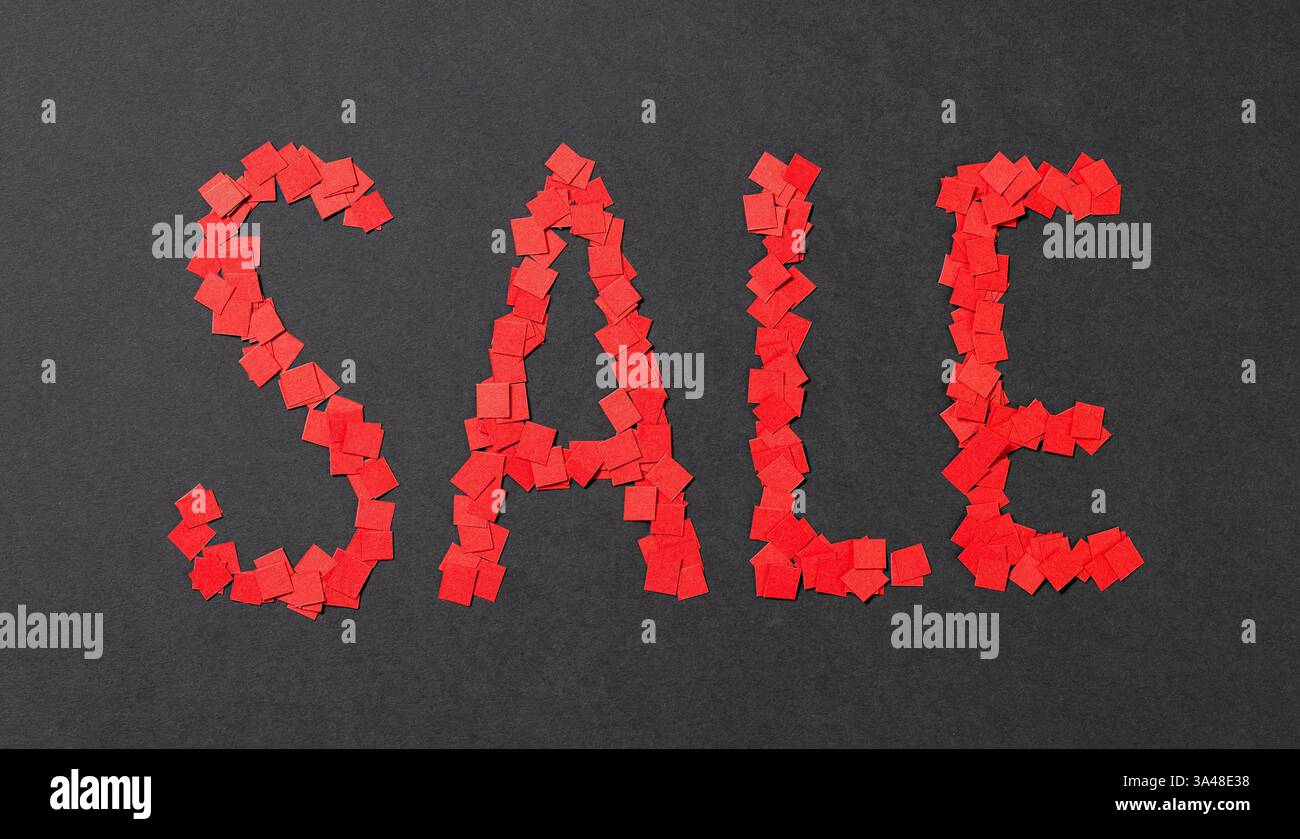 Word Sale sign made from small pieces of red colored applique paper ...