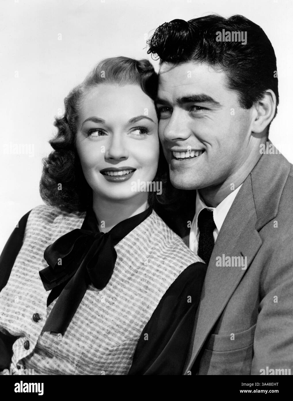 Gloria Henry, Jeff Richards, publicity portrait for the film, "Kill the Umpire", Columbia ...