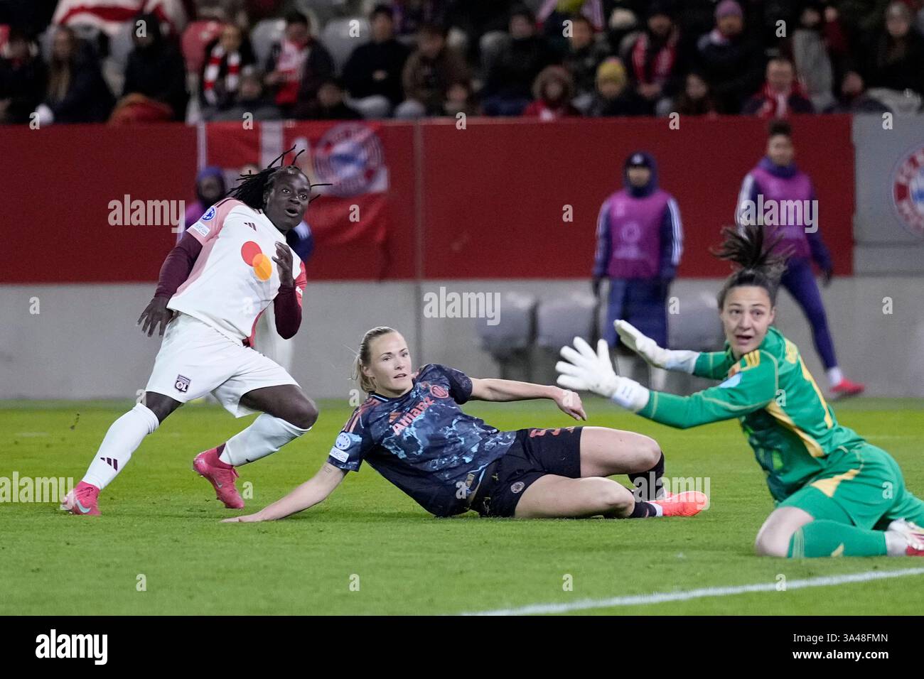 Lyon's Tabitha Chawinga, left, scores the opening goal during the Women ...