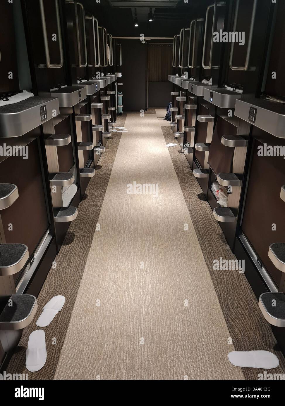A Japanese capsule hotel in Tokyo Stock Photo - Alamy