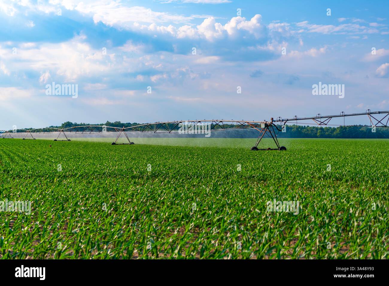 Pivot irrigation system in agricultural farmland. Farming and ...