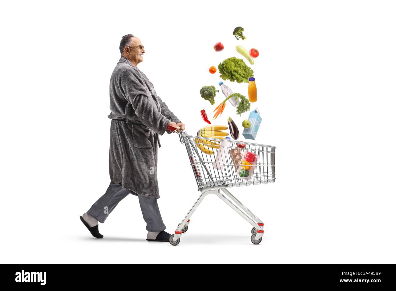 Man in a bathrobe with falling food products in a shopping cart ...