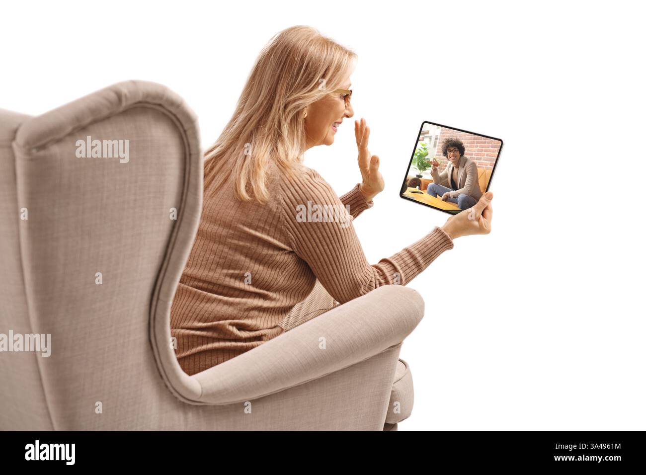 Family using tablet video call hi-res stock photography and images - Alamy