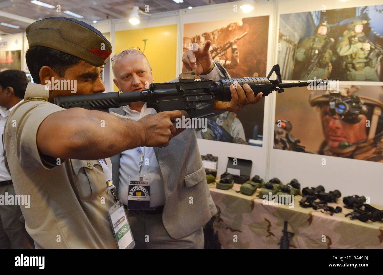NEW DELHI, INDIA â€“ JULY 19: A policemen testing telescopic sights ...