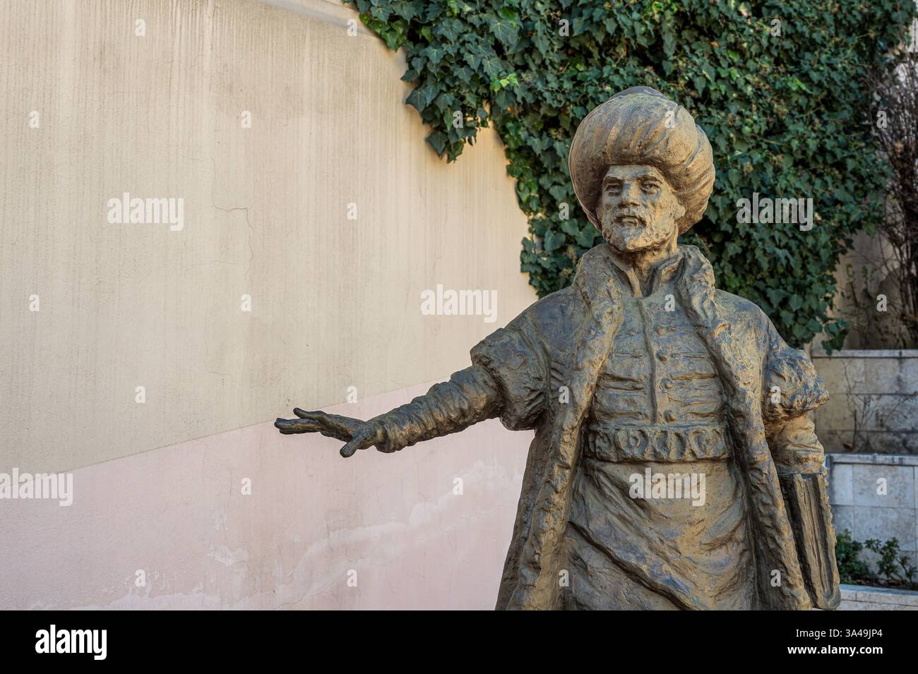 statue of İbrahim Peçevi, in front of Hassan Pasha Mosque, Pécs ...