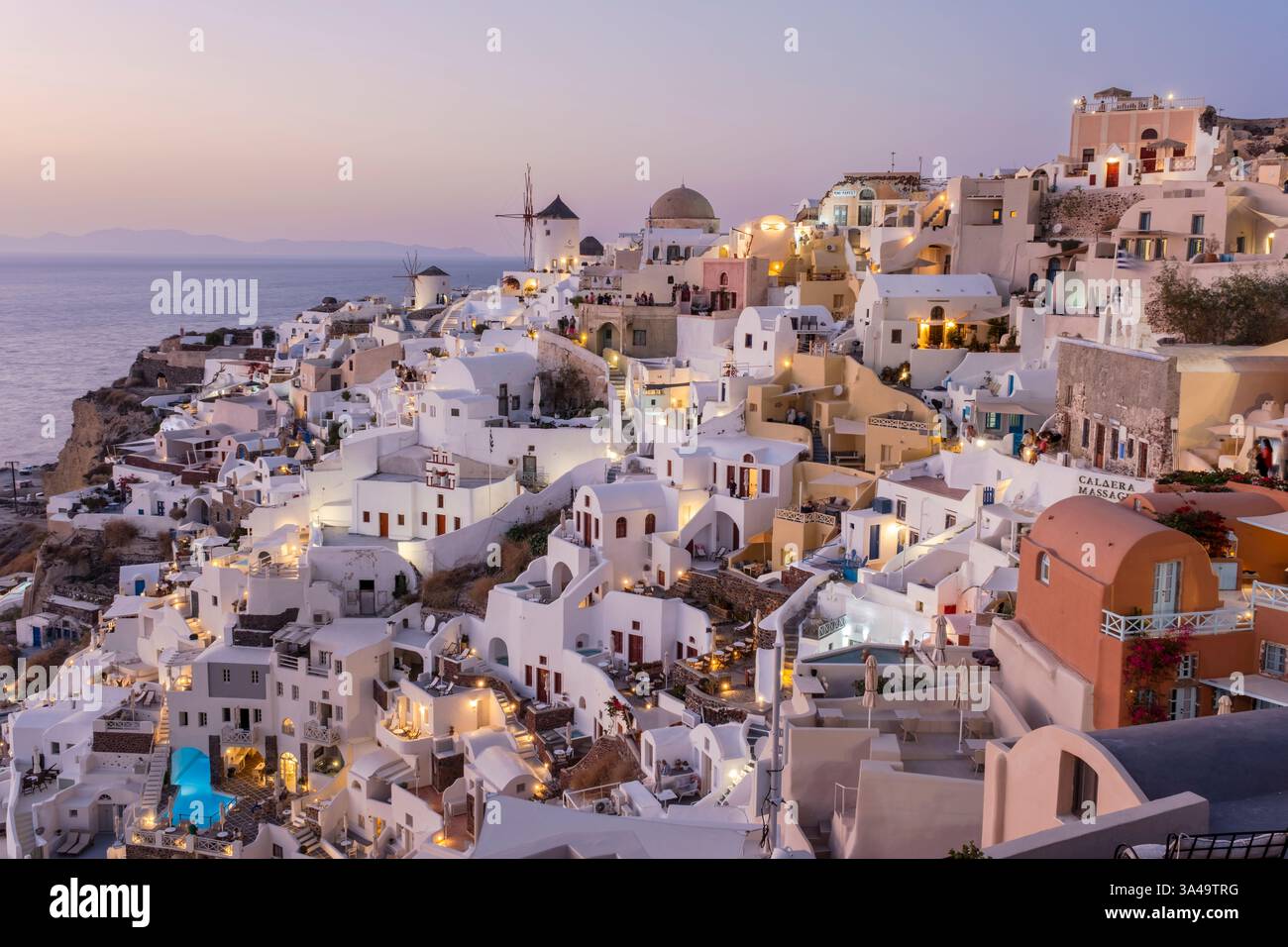 Sunset view Oia in Santorini viewed from Fort, Agios Nikolaos Castle ...