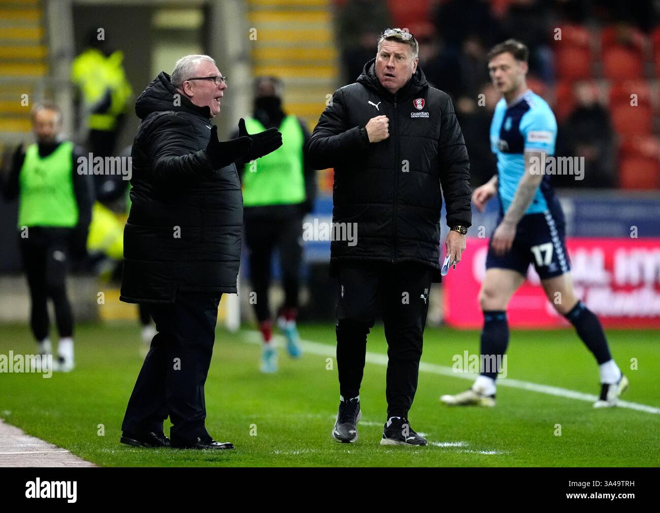 Rotherham United manager Steve Evans and assistant manager Paul Raynor ...