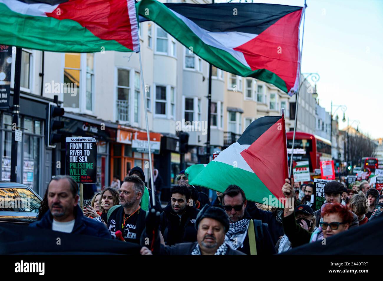 March 18, 2025: Brighton, UK. 18 March 2025. Protesters rally in the ...