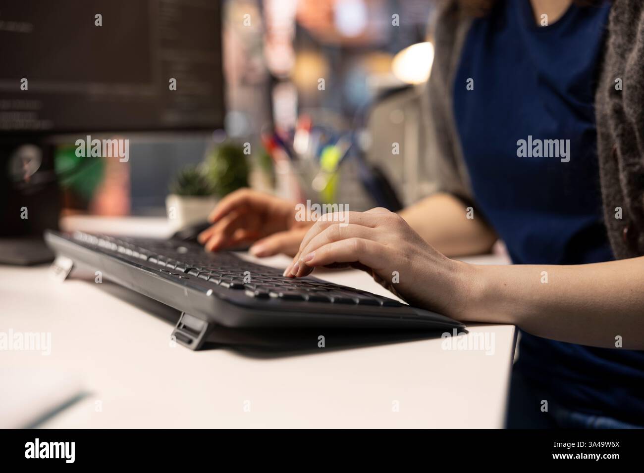 Young Woman At The Office Looking At Ui On Pc Display And Executing Binary Code For Testing And