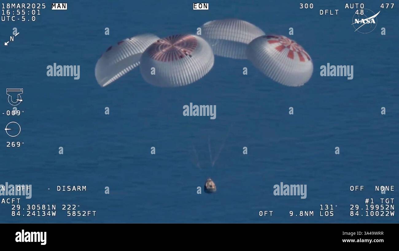 In this image taken from video provided by NASA, a SpaceX capsule, with ...