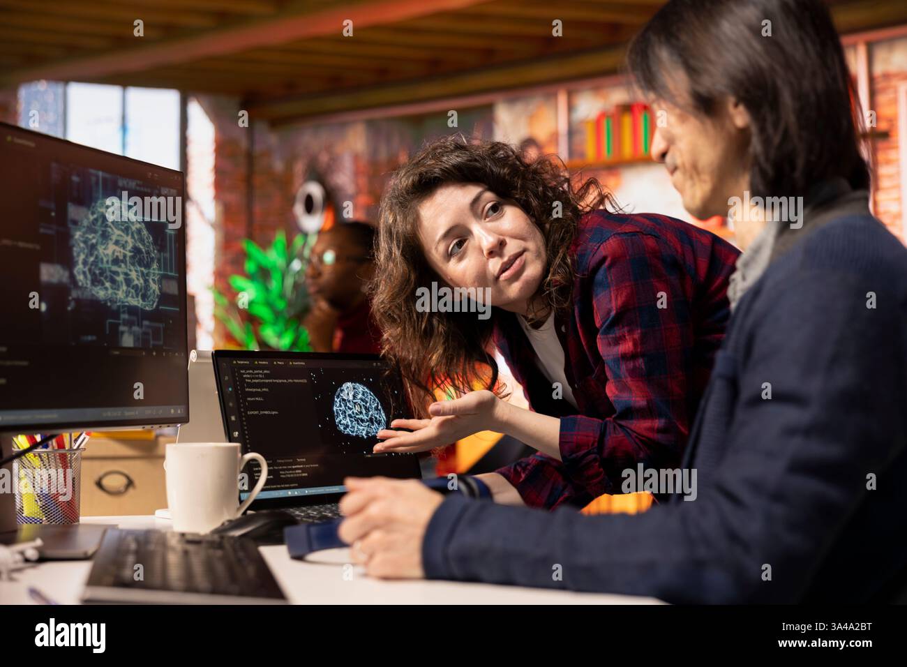 Startup Intern Asks Questions To Senior Technician Coding Advanced Ai Algorithm And Machine
