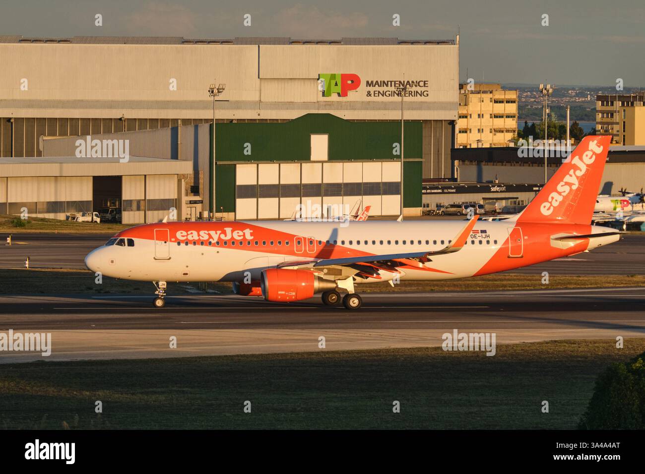 easyJet Airbus A320-214 passenger plane taxi on runway in Humberto ...