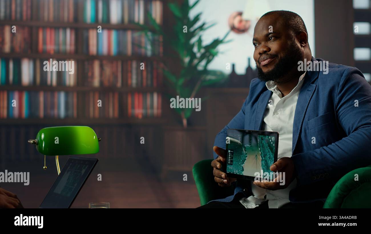 African american CIA expert monitoring reconnaissance satellite ...