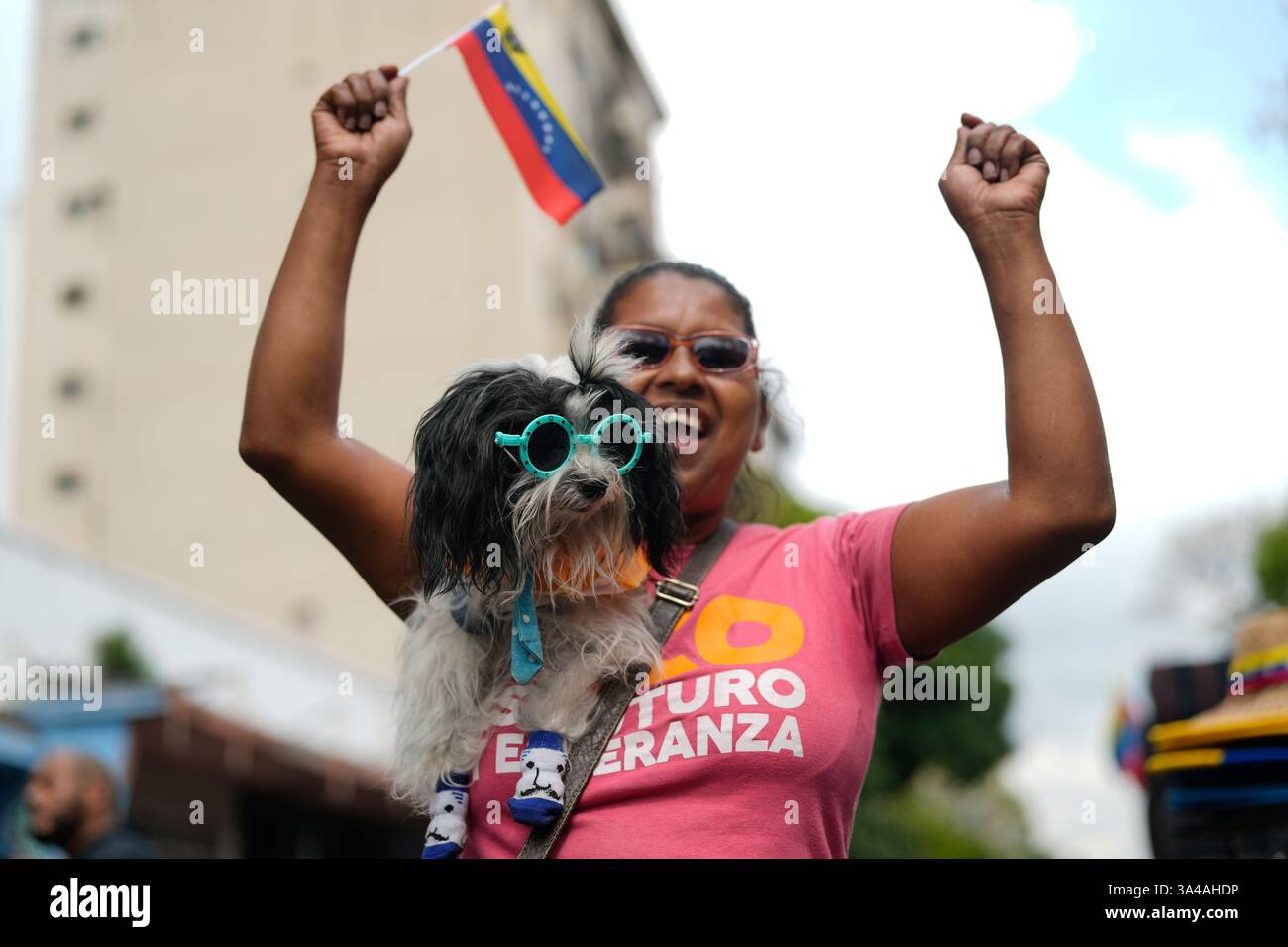 A woman attends a government-organized rally to protest the deportation ...