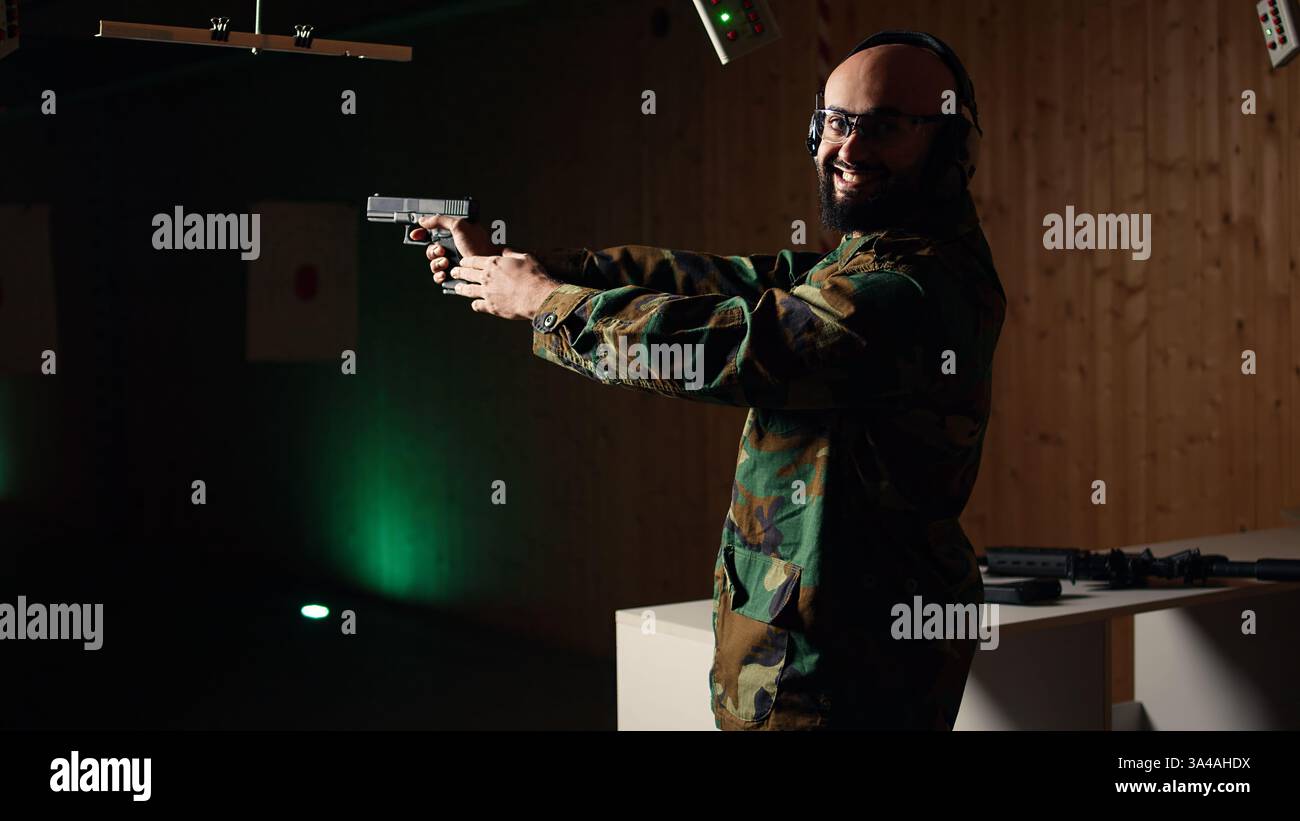 Portrait of cheerful military unit using tactical operations equipment ...