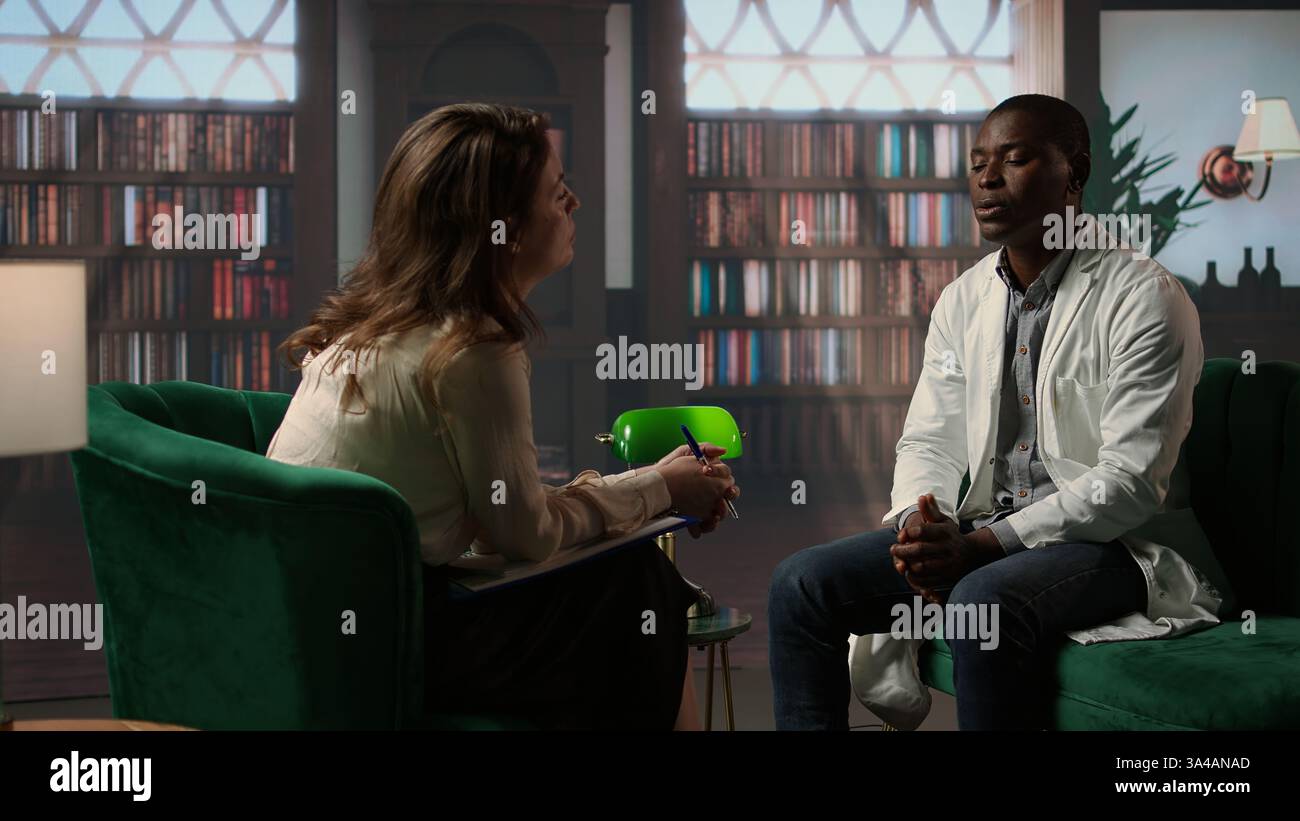 Worried sad man receiving psychological hi-res stock photography and ...