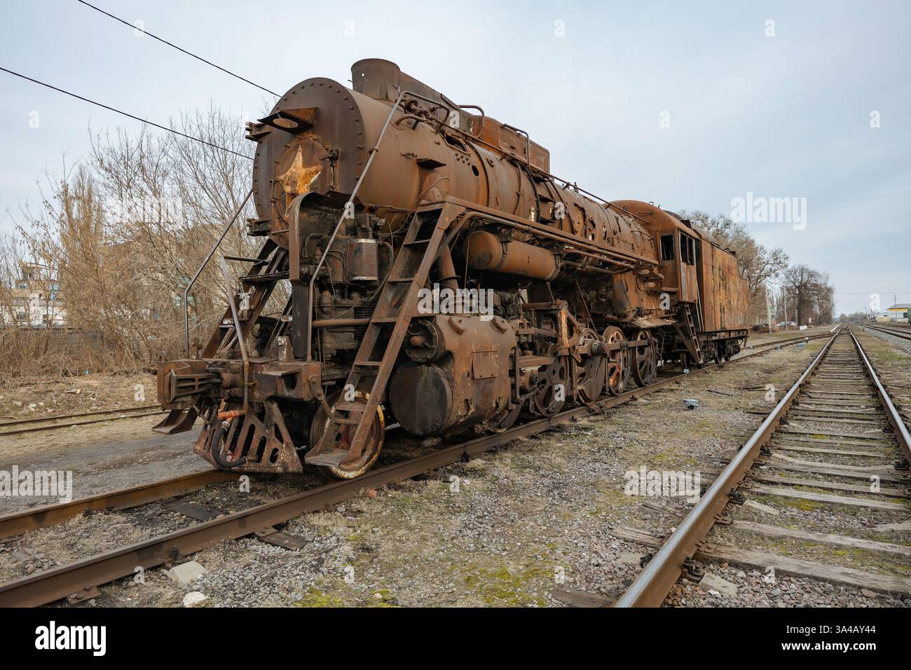 Old rusty abandoned steam locomotive Stock Photo - Alamy