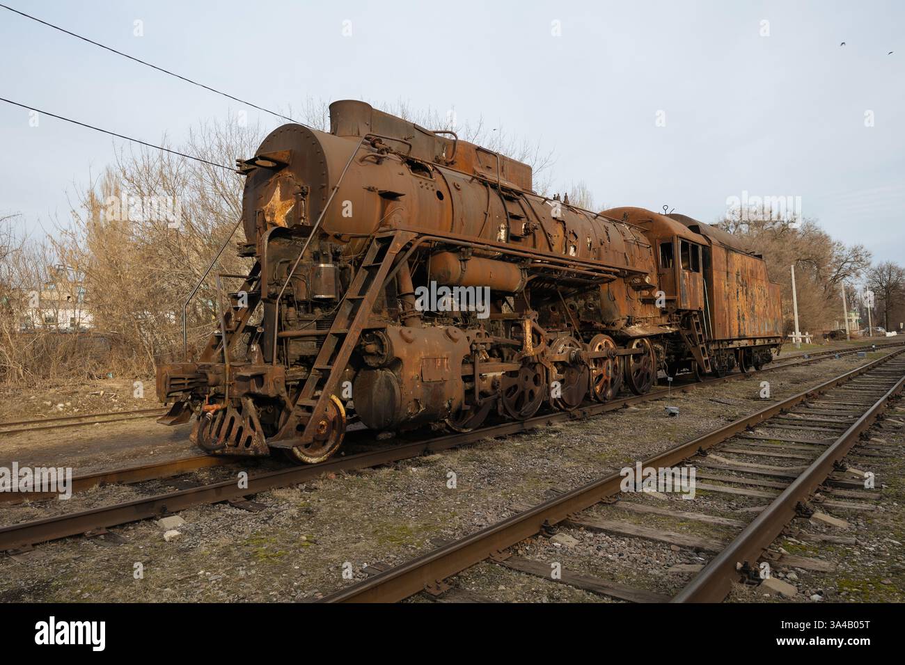 Old rusty abandoned steam locomotive Stock Photo - Alamy