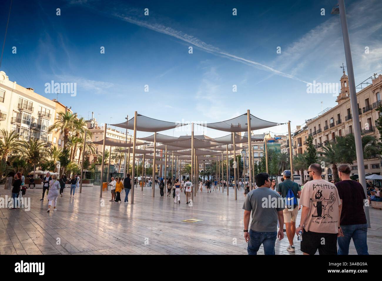 VALENCIA, SPAIN - OCTOBER 13, 2024: Crowds gather at the lively Plaza ...