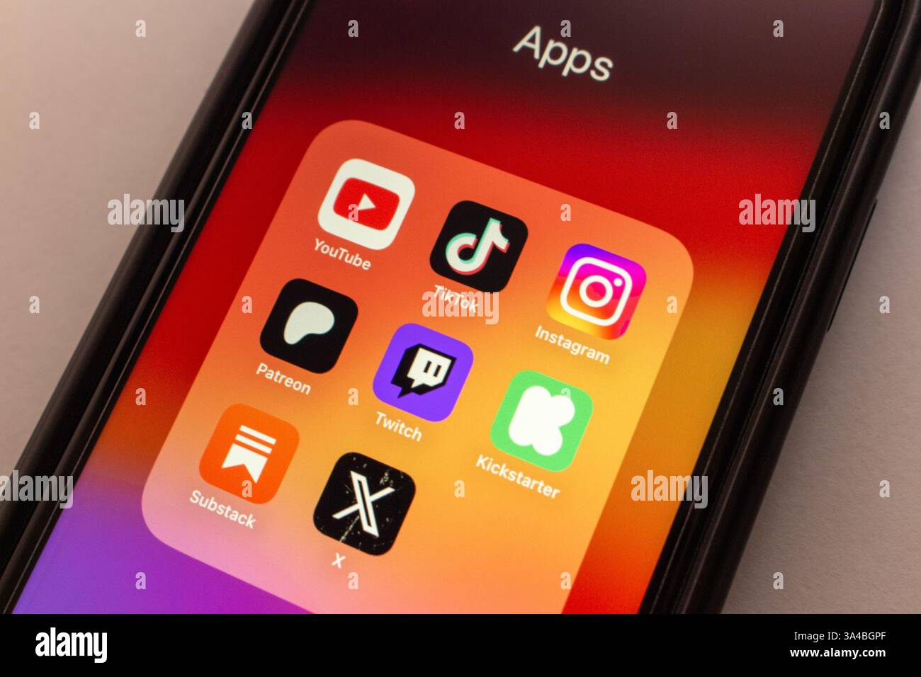 YouTube, TikTok, Instagram, Patreon, Twitch, Kickstarter, Substack, and X app on an iPhone ...