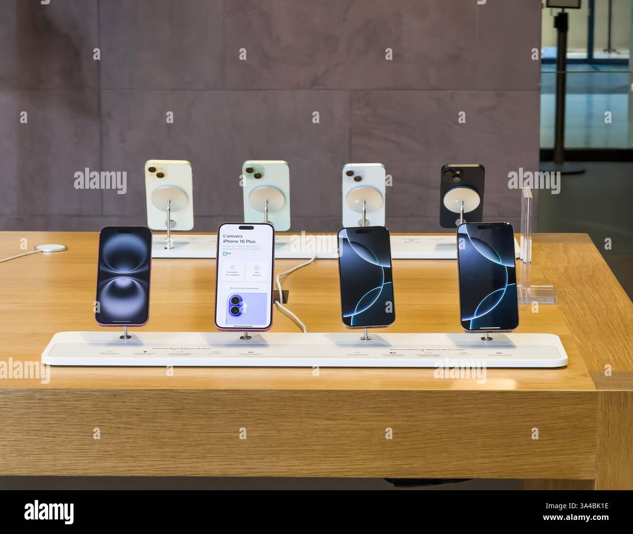 Paris, France - Feb 18, 2025: A front view of iPhone 16, iPhone 16e ...