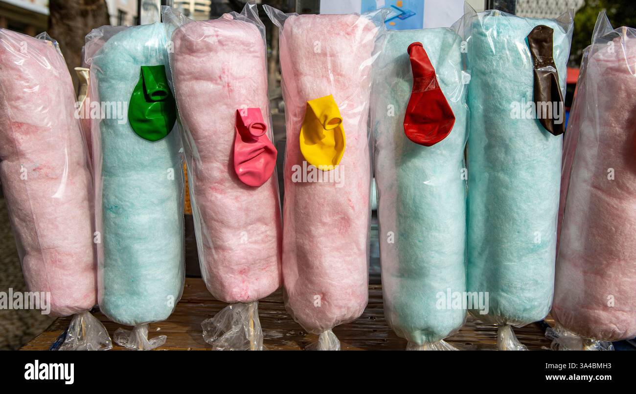 Colorful cotton candy to sale on street market Stock Photo - Alamy