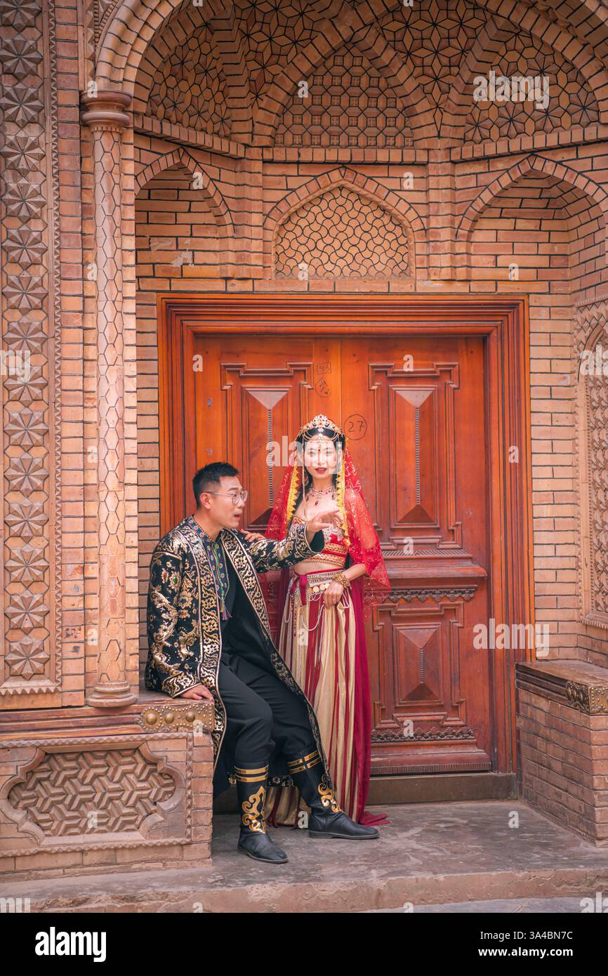 Kashgar, Xinjiang, China - JULY, 17, 2023: A couple wearing Uighur ...
