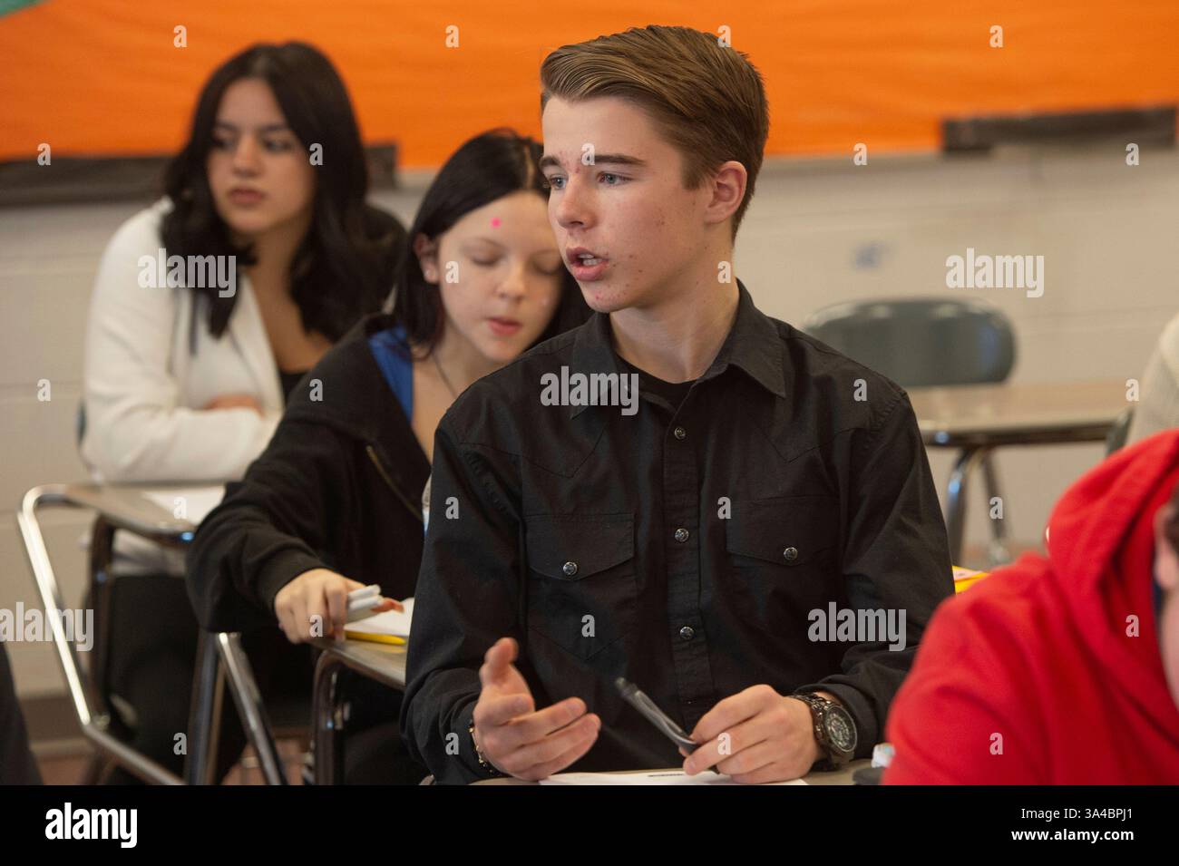 Mansfield Senior High School freshman Nathan Baker, 14, speaks during ...