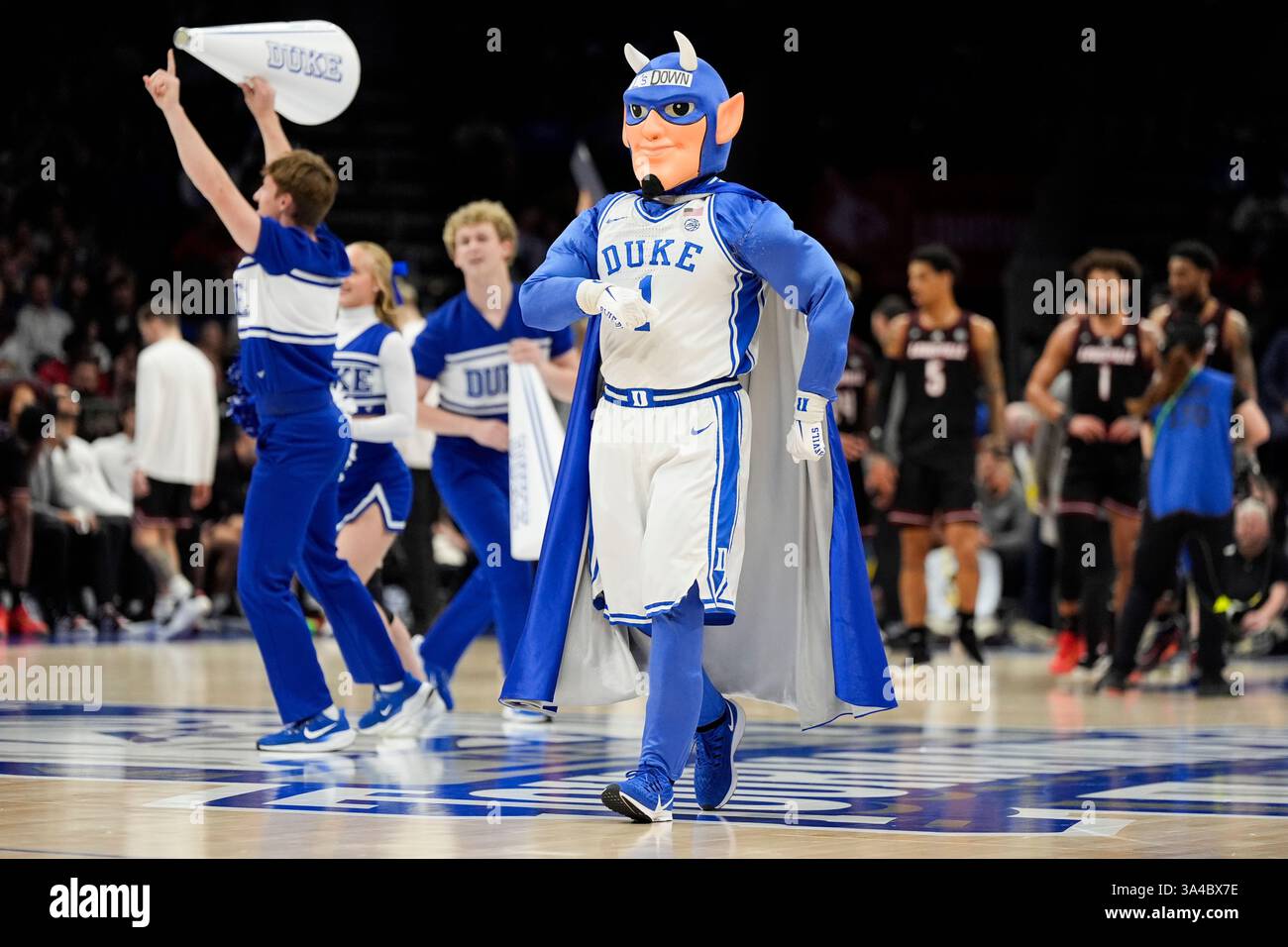 The Duke mascot performs during an NCAA college basketball game against ...