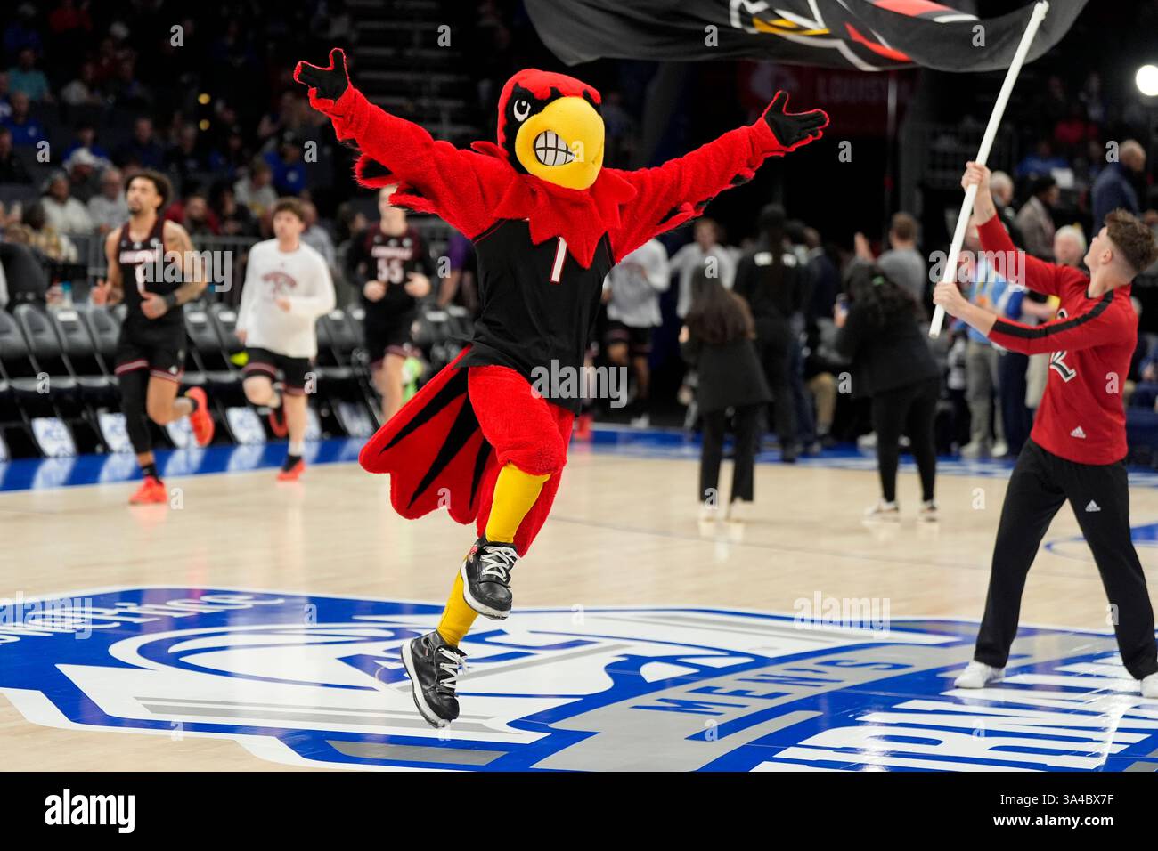 The Louisville mascot performs during an NCAA college basketball game ...
