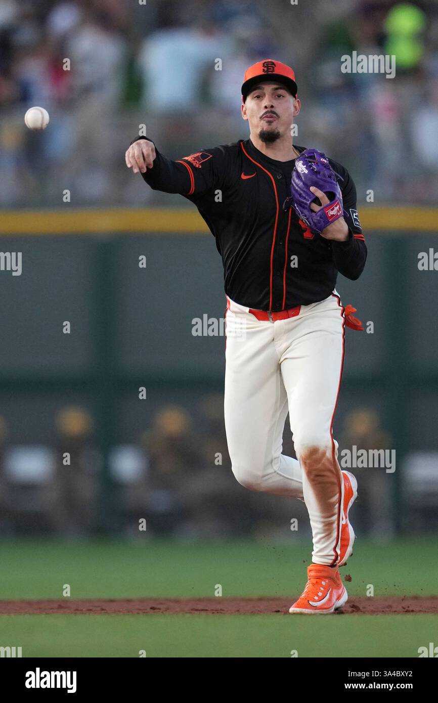 San Francisco Giants shortstop Willy Adames throws to first base to get ...