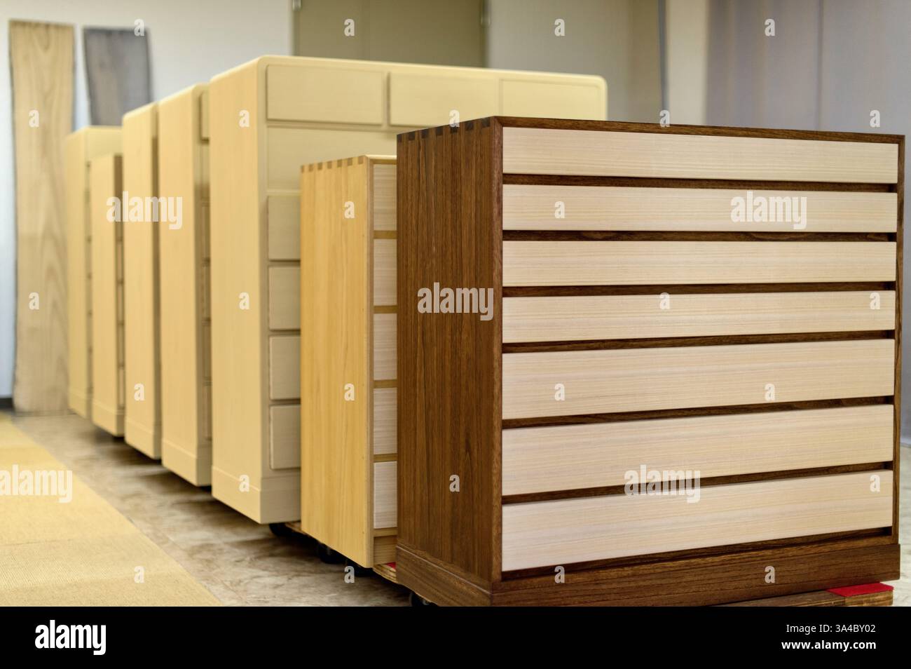 Photo shows the front of completed kiri-tansu furniture at Kamo Kiri ...