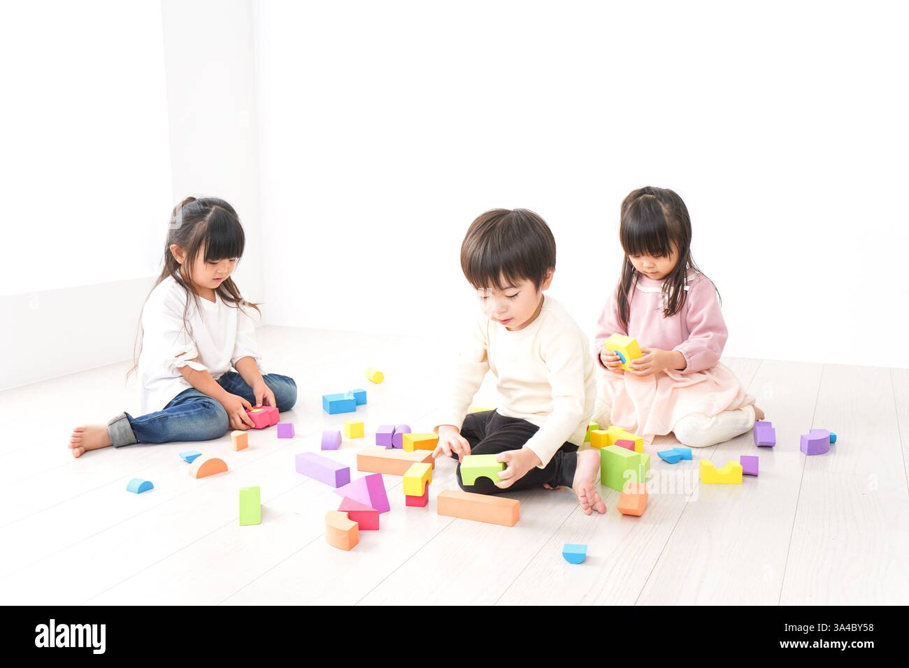 Children playing with blocks Stock Photo - Alamy