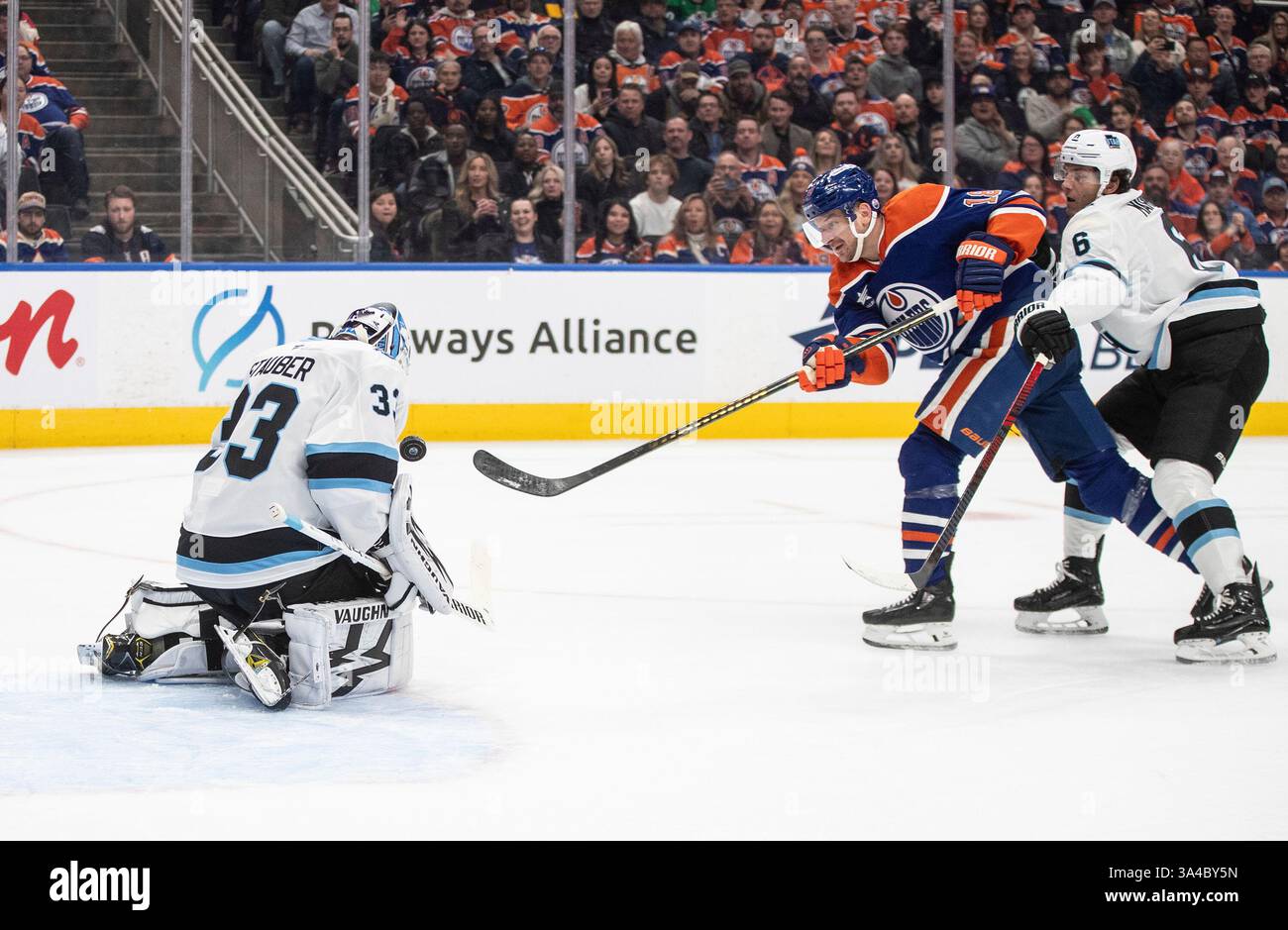 Utah Hockey Club goalie Jaxson Stauber (33) makes a save on Edmonton ...