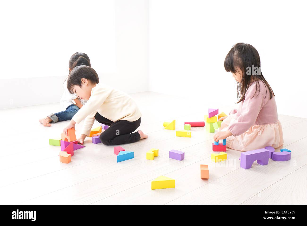 Children playing with blocks Stock Photo - Alamy