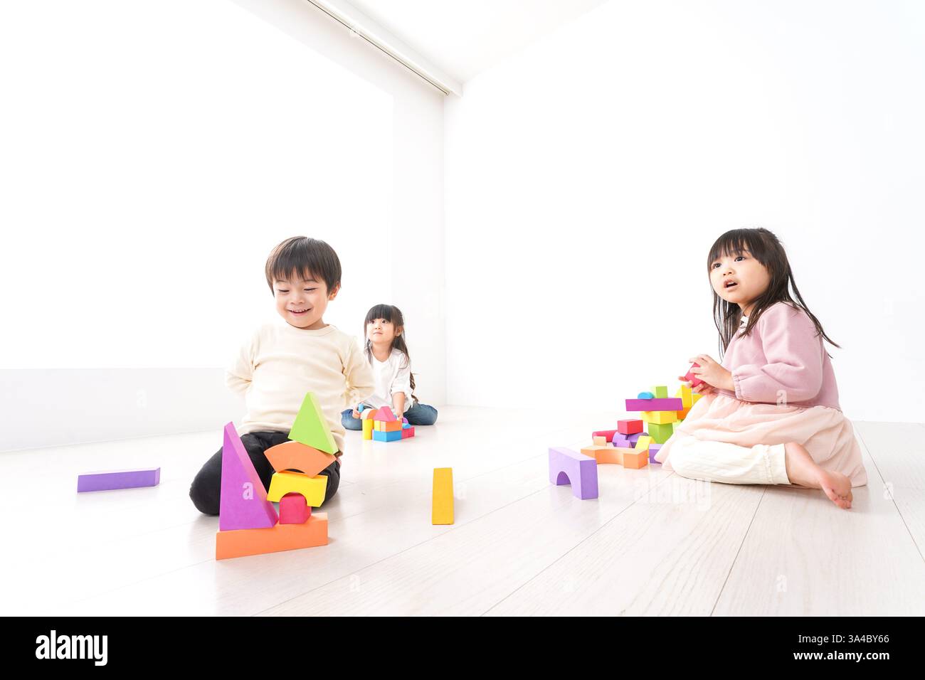 Children playing with blocks Stock Photo - Alamy
