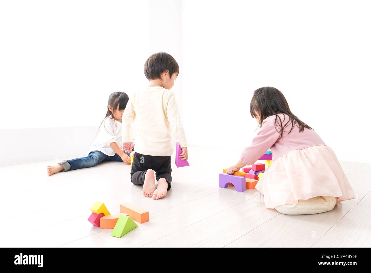 Children playing with blocks Stock Photo - Alamy