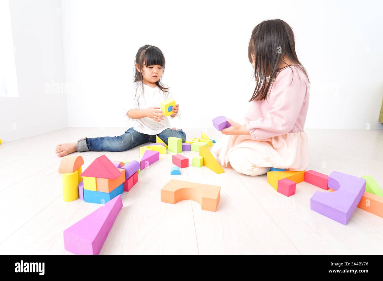 Children playing with blocks Stock Photo - Alamy