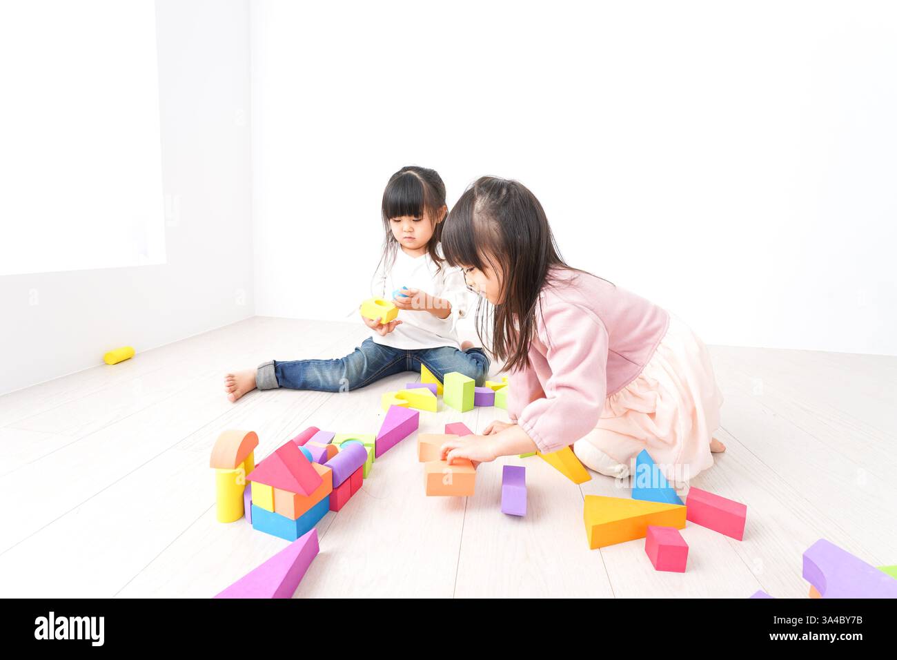 Children playing with blocks Stock Photo - Alamy